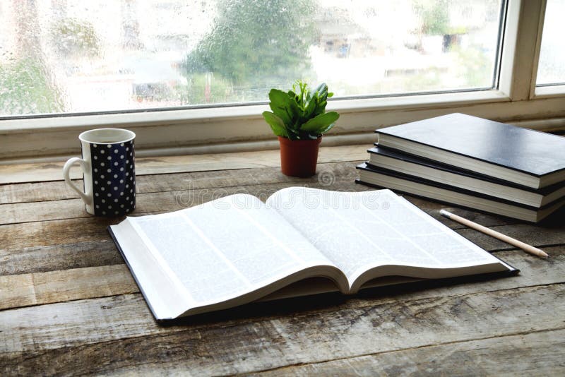 Reading book on table stock image. Image of heap, stack - 102956973