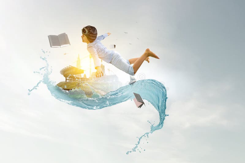 World of Books Concept with Flying Boy . Mixed Media Stock Image ...