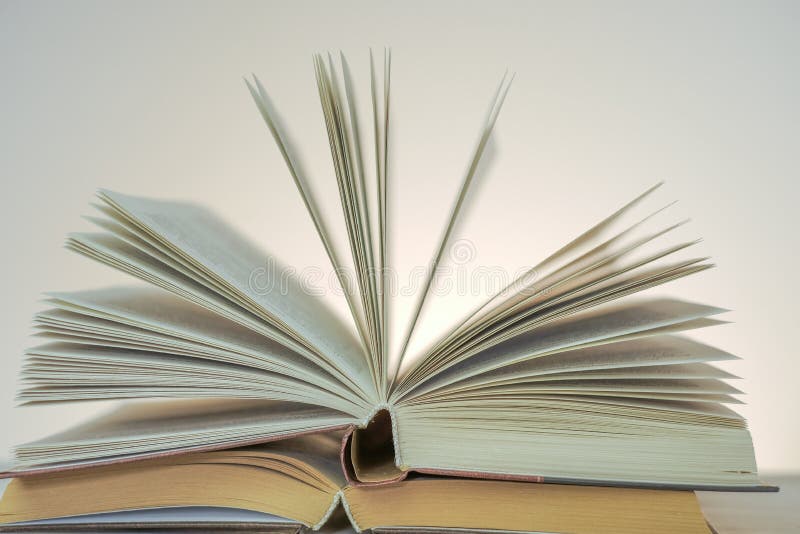 Reading Books.Open Blank Books on a Light Background.stack of Books on ...