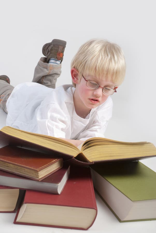 Reading boy stock photo. Image of child, glasses, educational - 10220402