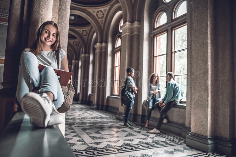 Reading during a Break.Beautiful Student Preparing To the Lesson while ...