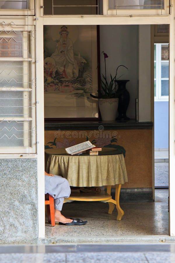 Reading in Buddhist temple stock image. Image of simple - 27096043
