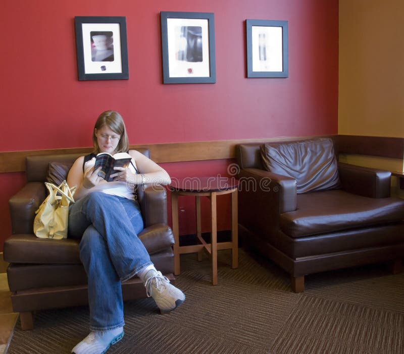 Reading in a coffee shop stock photo. Image of eyebrow - 4705138 Reading in a coffee shop stock photo. Image of eyebrow - 4705138