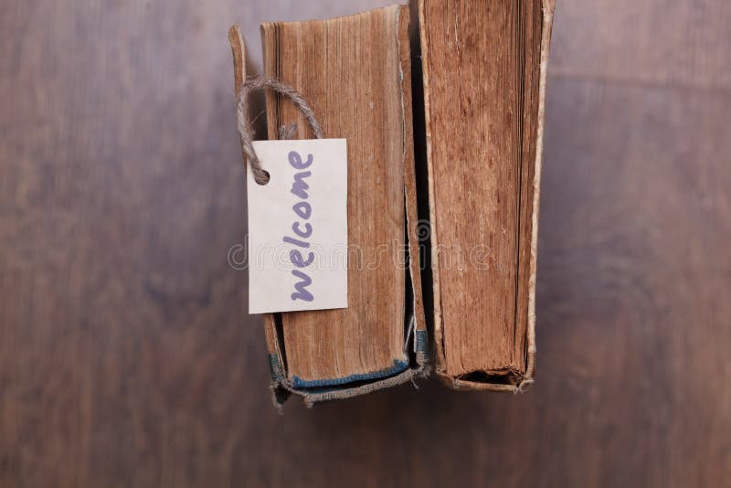 Reading Concept, Top Viewed Vintage Book with a Sign - Welcome Stock ...