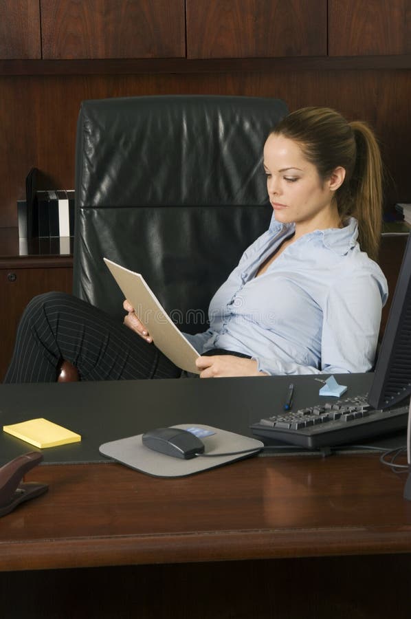 Reading the contract stock photo. Image of proofreading - 540504