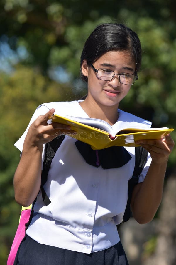 A Reading Cute Diverse Female Student Stock Photo - Image of reading ...