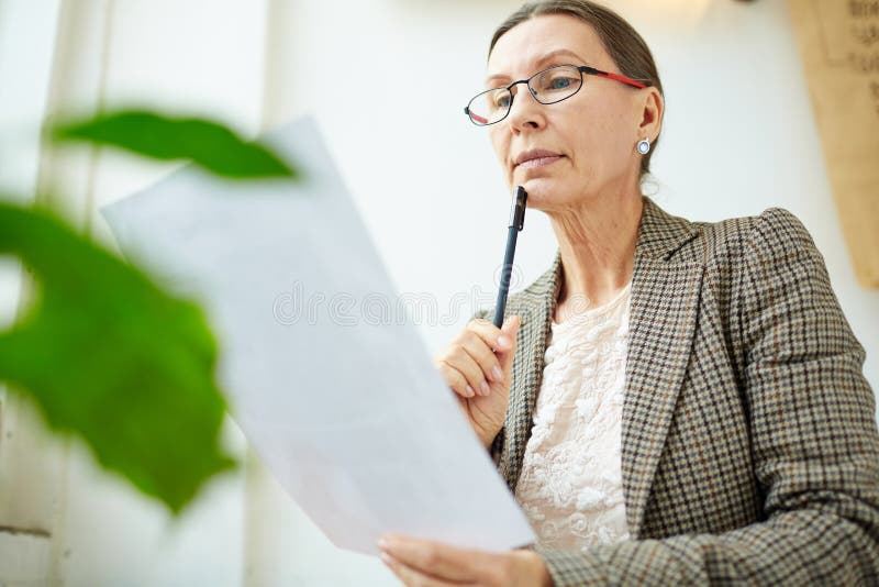 Reading document stock image. Image of woman, financial - 82073695