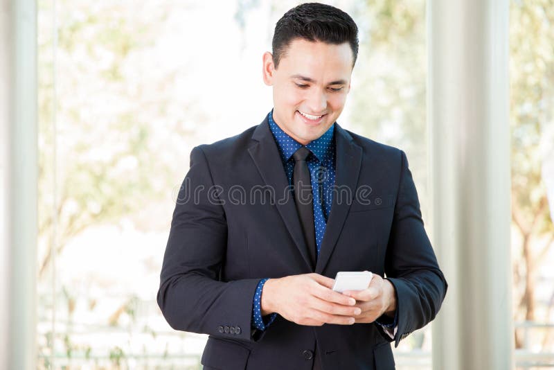 Reading emails on a phone stock image. Image of latin - 47880551