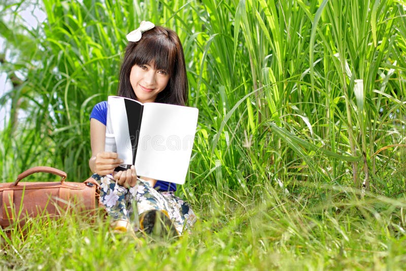 Reading is fun stock image. Image of lawn, beautiful - 17486399
