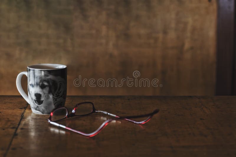 Reading Glasses with Coffee Cup on Wooden Counter Stock Photo - Image ...