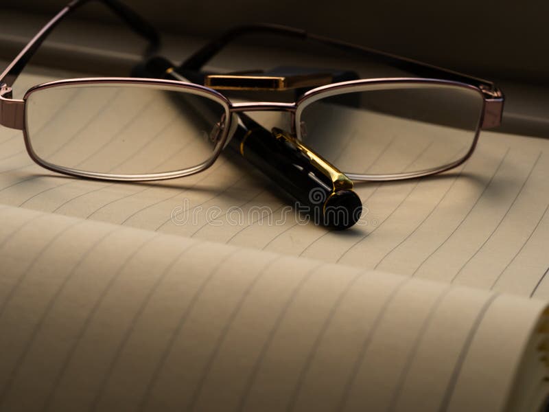 Reading Glasses and Pen on Diary Journal Stock Photo - Image of ...