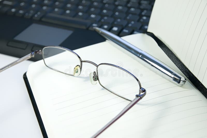 Reading Glasses and Pen on Notebook Stock Image - Image of list, empty ...