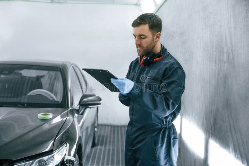 Reading Information Car Painter Standing Garage Documents Hands Stock ...