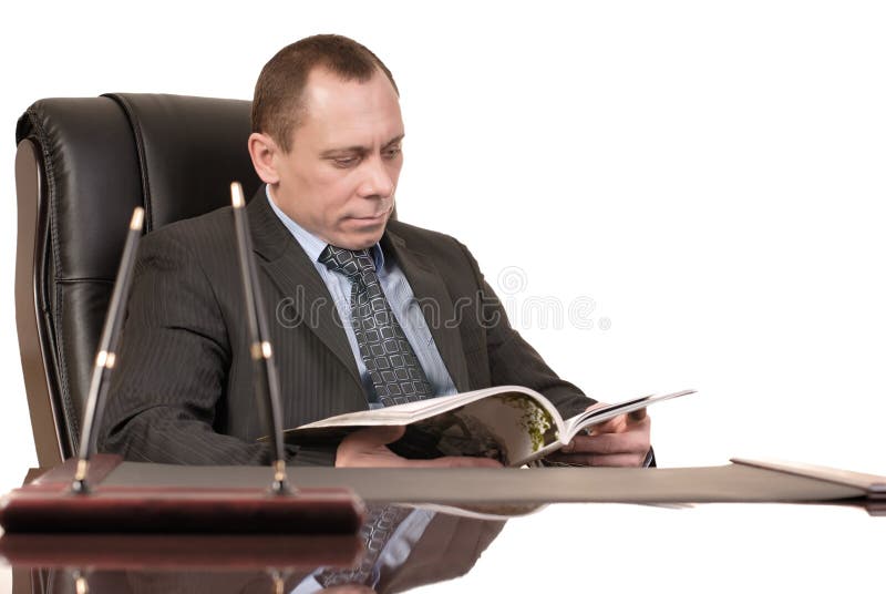 Businessman Reading Magazine Stock Photo - Image of office, black: 12715230