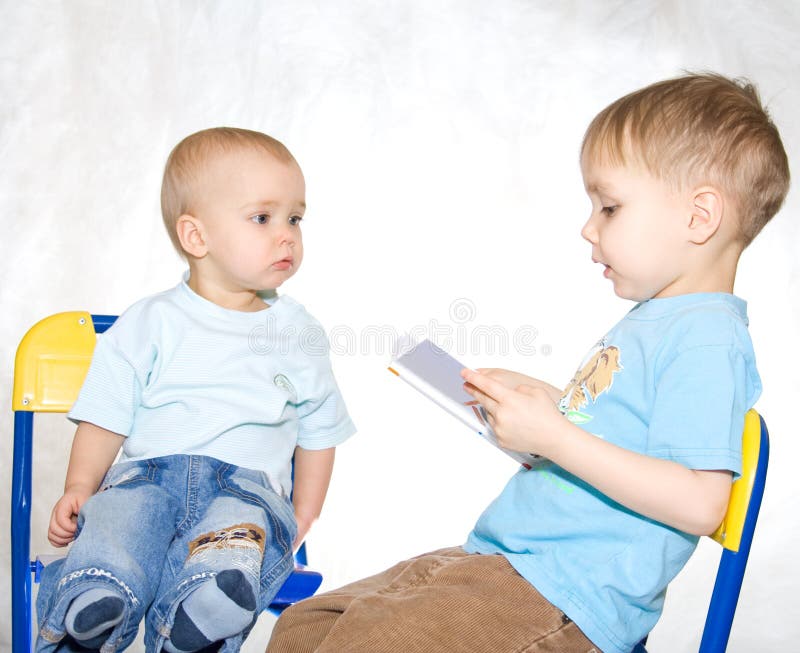 Reading kids stock image. Image of couple, play, expression - 4259845