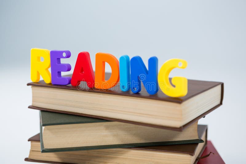 Reading Letter Blocks on Stack of Books Stock Image - Image of alphabet ...