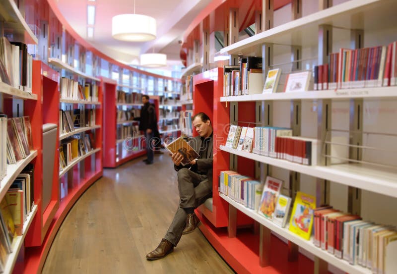 Reading in library stock image. Image of group, book - 17712527