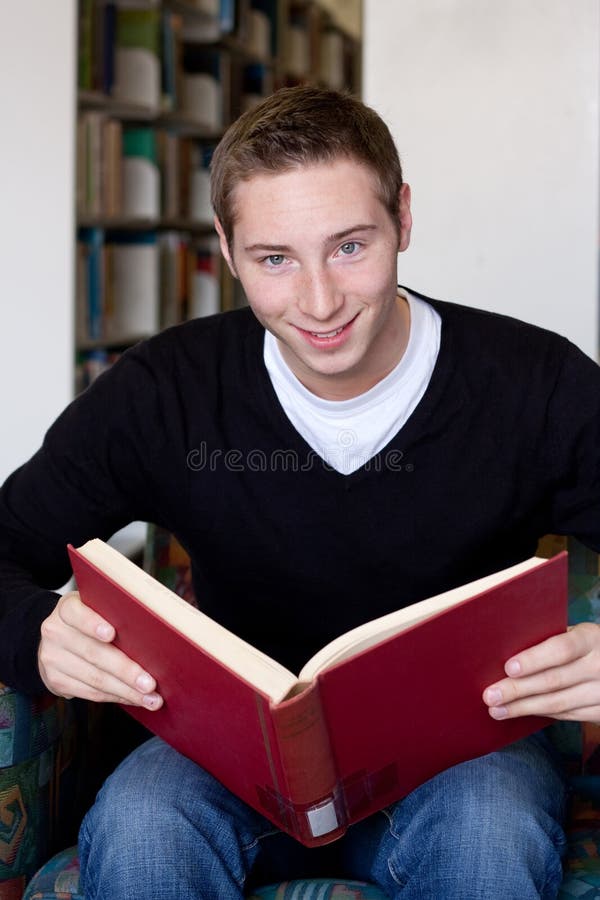 Reading at the Library stock photo. Image of holding - 18383060