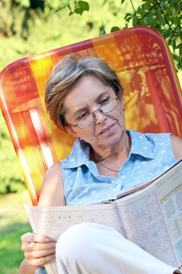 Reading magazine stock photo. Image of garden, portrait - 2652360