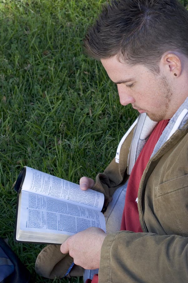 Reading Man stock image. Image of teens, reading, grass - 277329