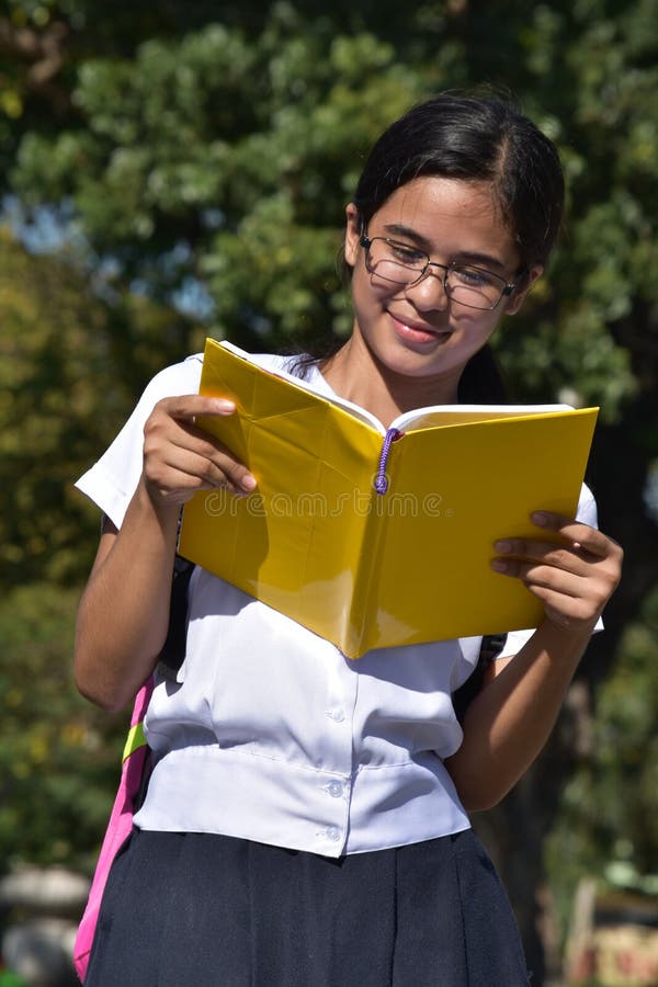 Reading Minority Girl Student with Notebooks Stock Image - Image of ...