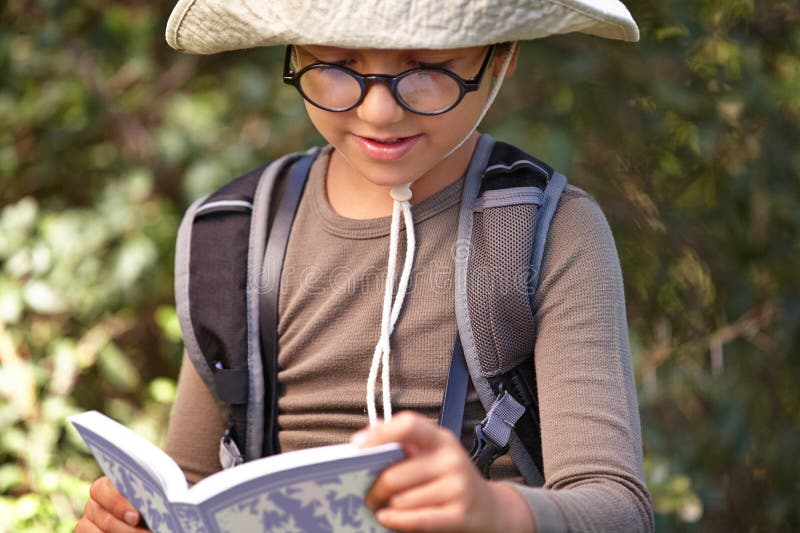 Reading and Nature are His Two Favourite Things. a Young Kid Reading a ...
