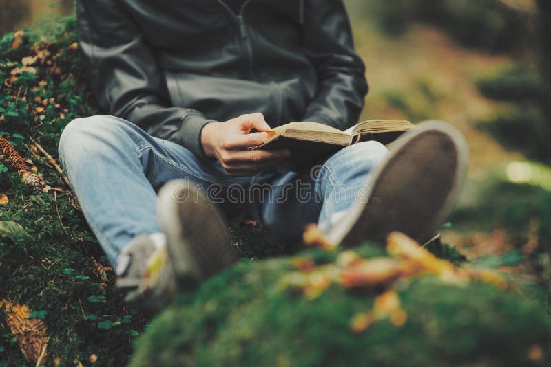Reading in nature stock image. Image of intellectual - 214254525