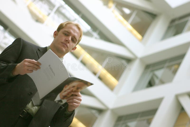 Reading the news stock image. Image of boss, serious, worker - 53279