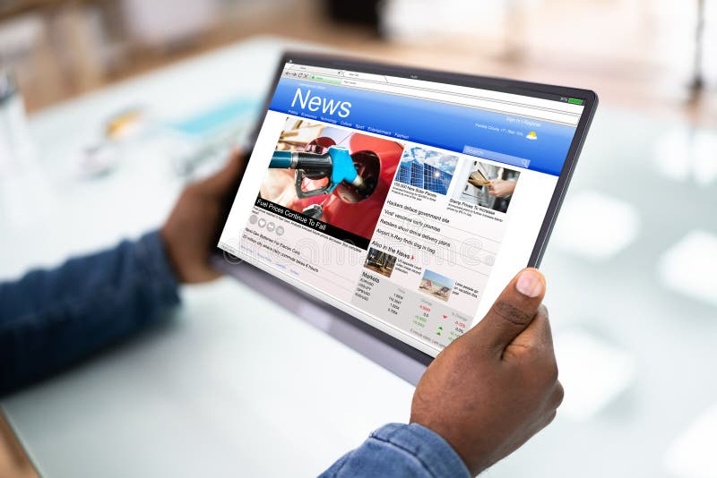 Reading Newspaper Article Online Stock Image - Image of read, computer ...