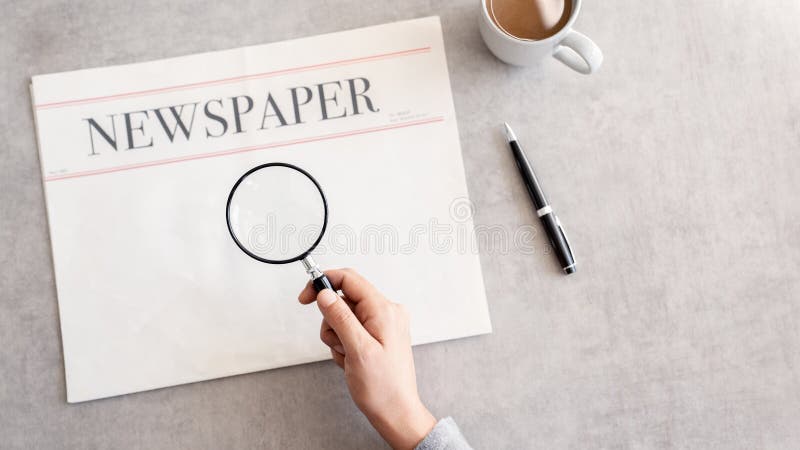 Reading Newspaper Concept on the Desk Stock Image - Image of magnifying ...
