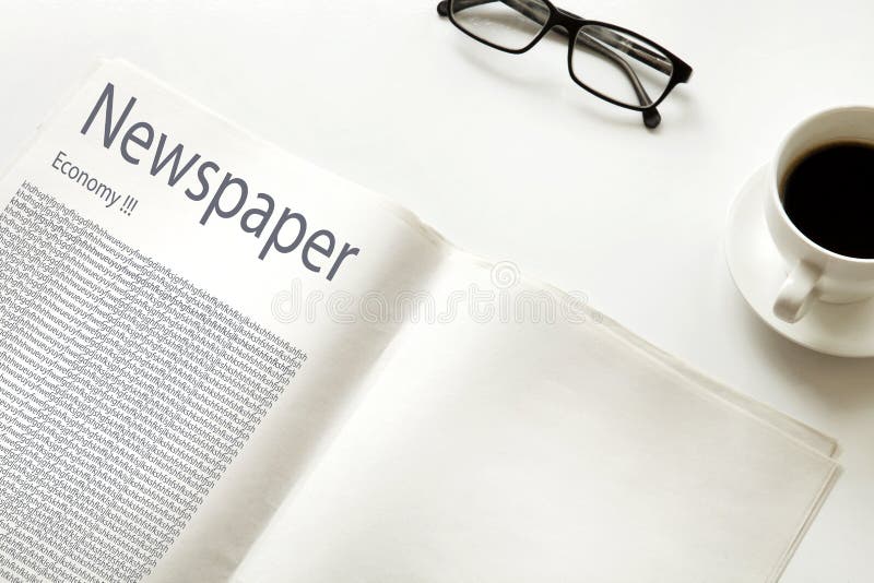 Reading newspaper on table stock photo. Image of press - 102885364