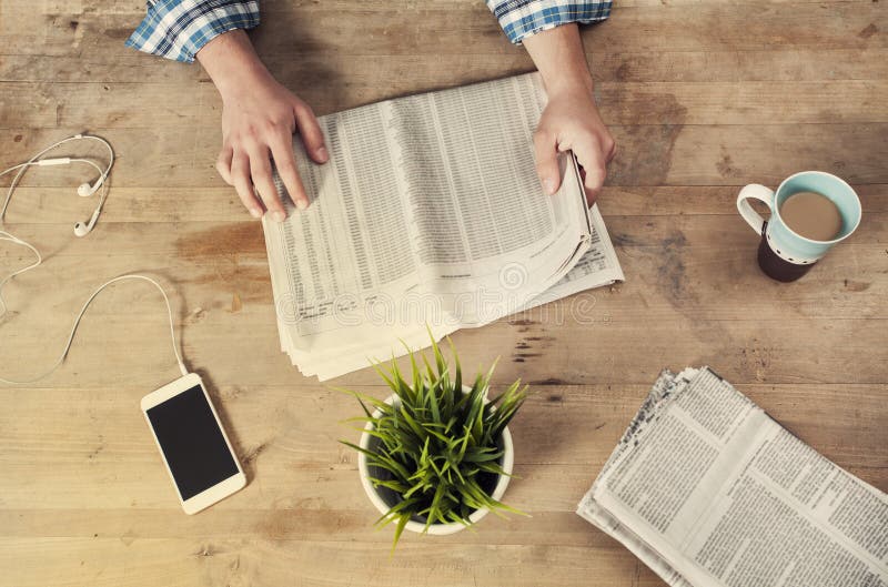 Reading Newspaper on Wooden Table Stock Photo - Image of background ...