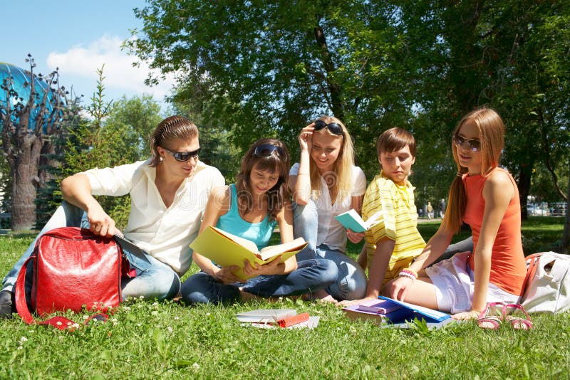 Reading outside stock image. Image of park, group, outside - 10539609