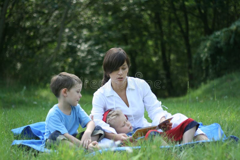 Reading outside stock image. Image of kids, happy, cheerful - 2970257