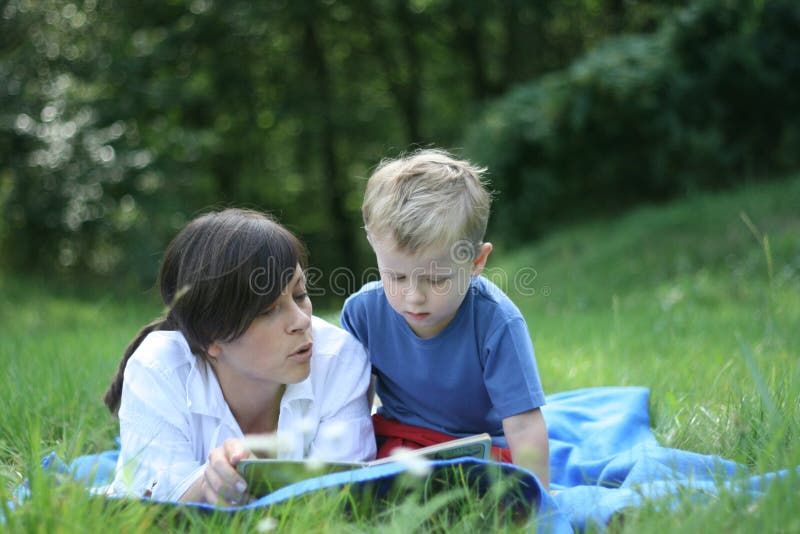 Reading outside stock image. Image of optimistic, outside - 2970295