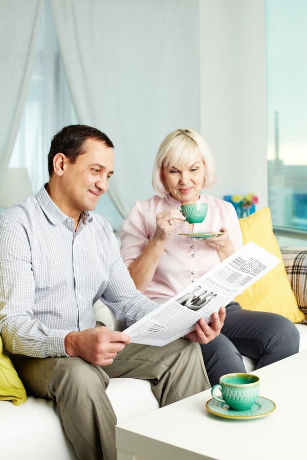 Reading paper stock photo. Image of family, home, people - 25443624