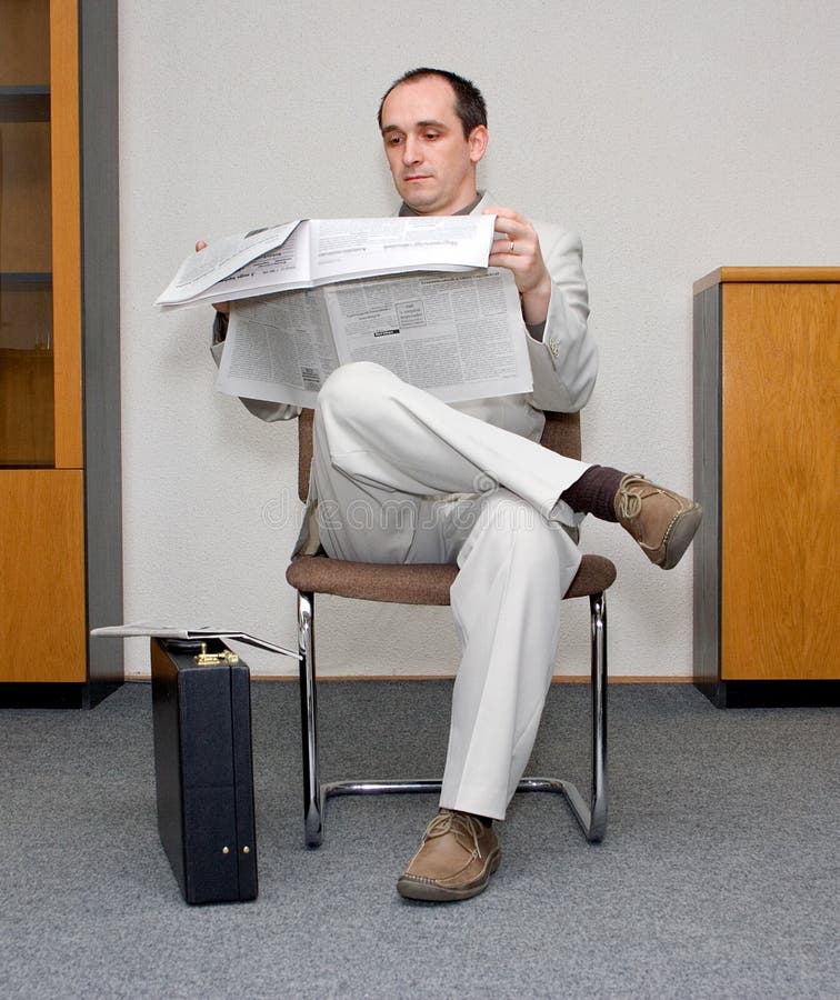 Reading the papers stock photo. Image of papers, case - 2193356