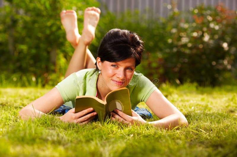 Reading in the park stock photo. Image of relax, garden - 20116338