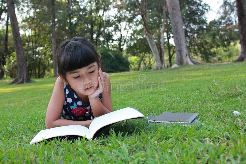 Reading in the park stock photo. Image of park, relax - 66092944