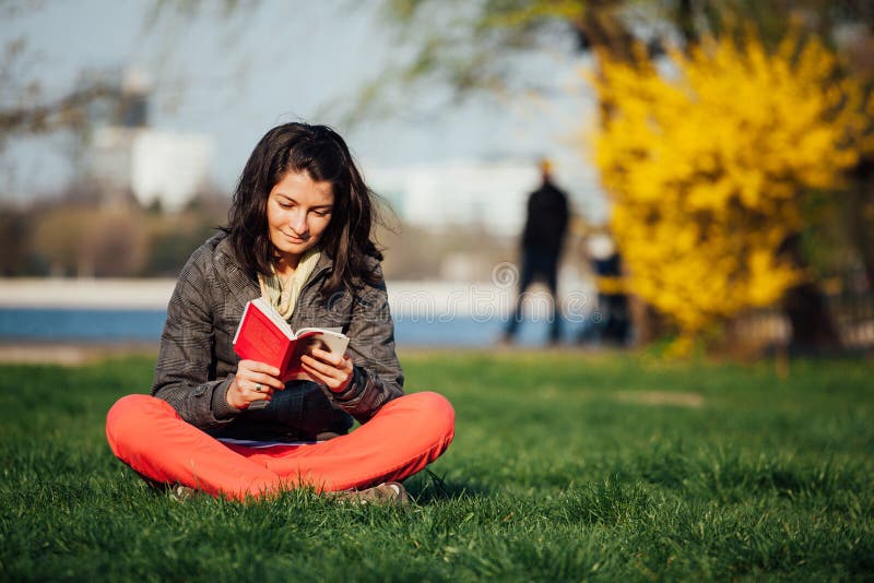 Reading in the park stock image. Image of alley, path - 59230027
