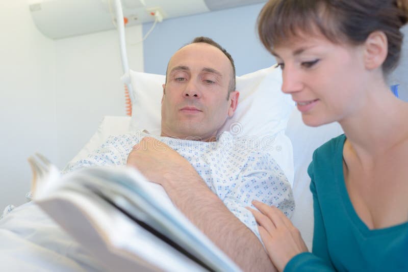 Reading patient book stock image. Image of husband, recovery - 100306067