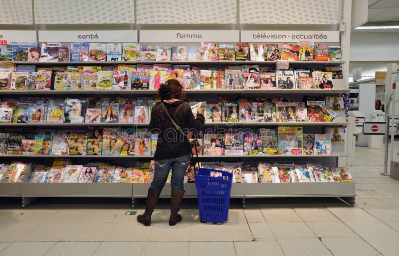 Reading periodicals editorial stock image. Image of periodicals - 23651129