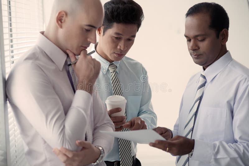 Reading report stock photo. Image of executive, ethnic - 49014482