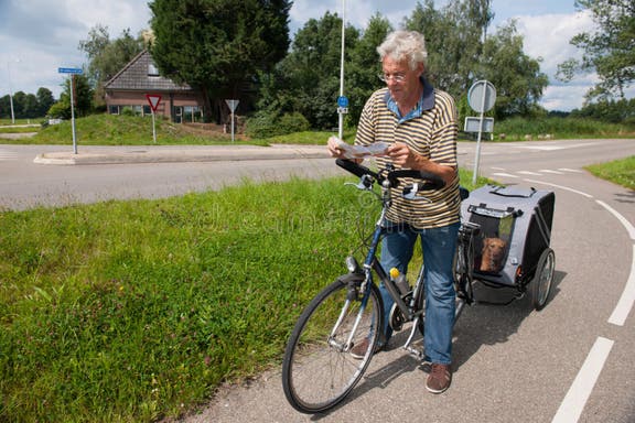 Reading the Route Map by Biker Stock Image - Image of holland, outdoor ...