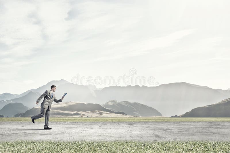 Reading on the run stock photo. Image of intelligence - 59803856