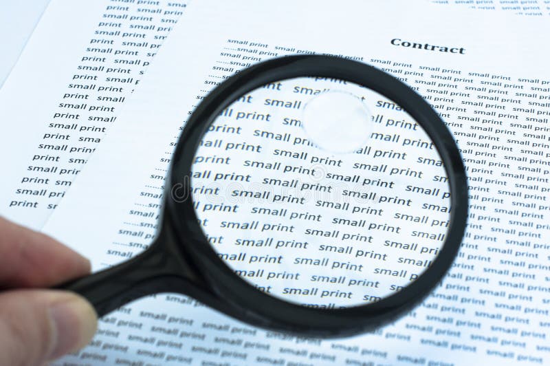 Reading the small print stock photo. Image of close - 173443738
