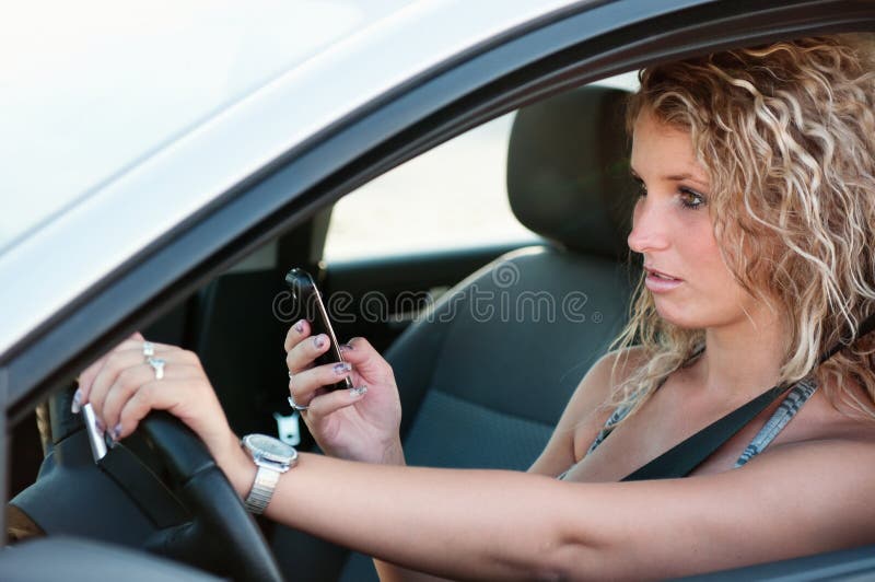Reading SMS while Driving Car Stock Image - Image of interior ...