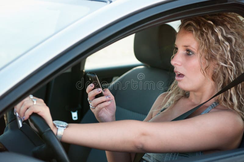 Reading SMS while Driving Car Stock Image - Image of lifestyles ...