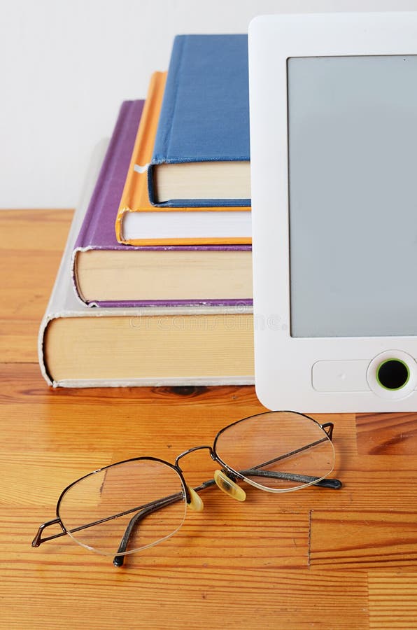 Stack of Colorful Books with Electronic Book Reader Stock Photo - Image ...
