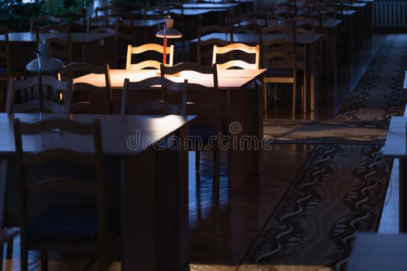 Reading at the Table with a Lamp in the Library Stock Image - Image of ...